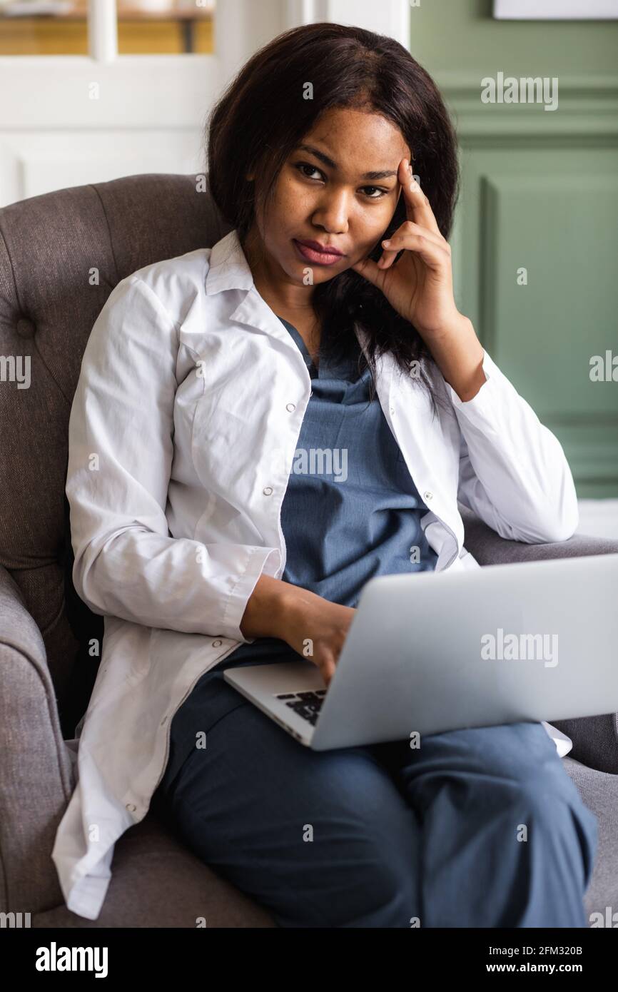 Black doctor. Telemedicine the use of computer and telecommunications ...