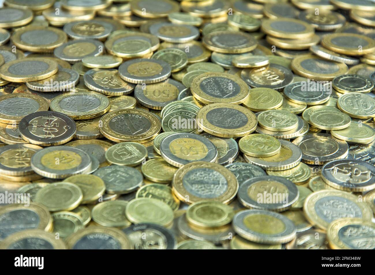 Coins stack background in close-up Stock Photo - Alamy