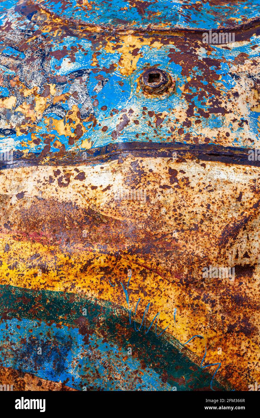 Abstract graphics on a rusting steel buoy washed up on a Steveston ...