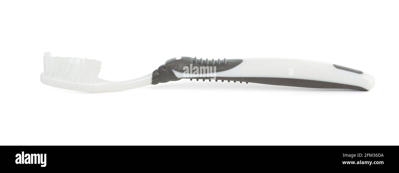 Grey plastic toothbrush on white background Stock Photo - Alamy