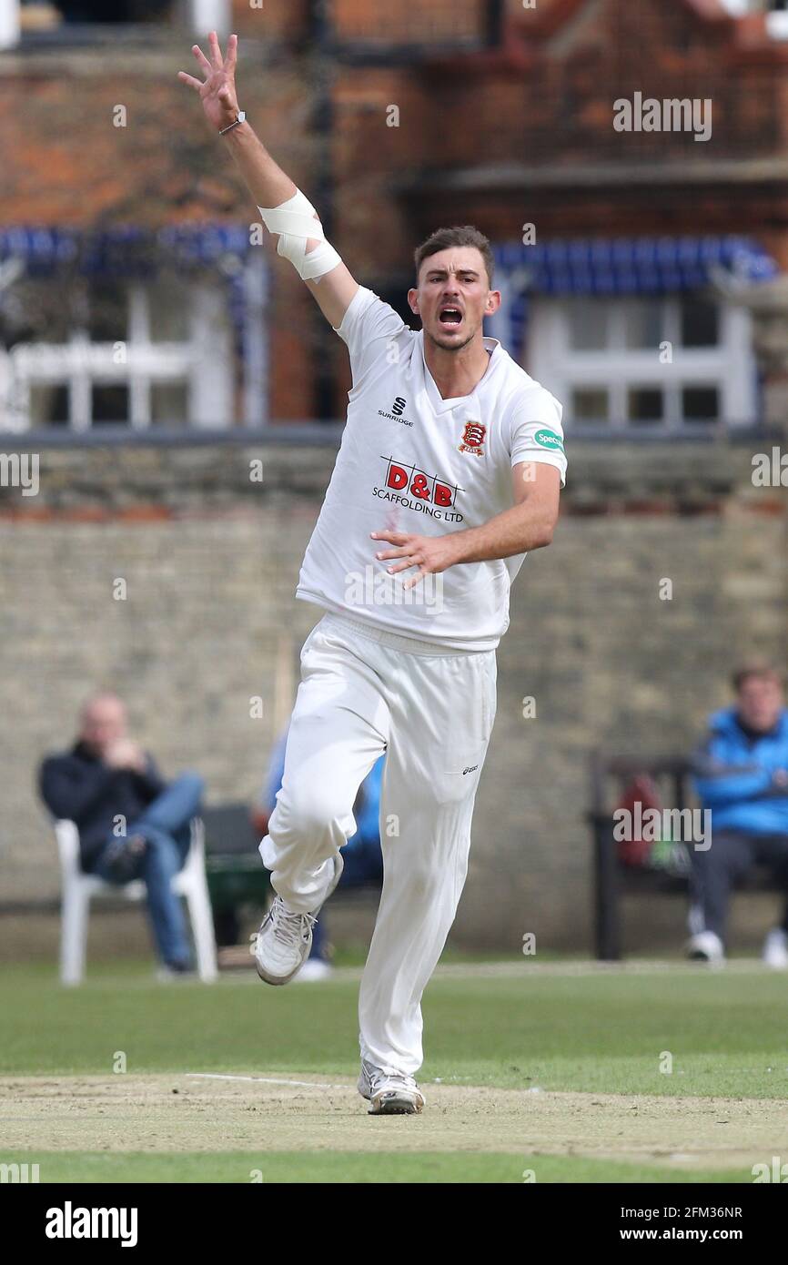 Matt Dixon of Essex celebrates taking the wicket of Avish Patel during ...