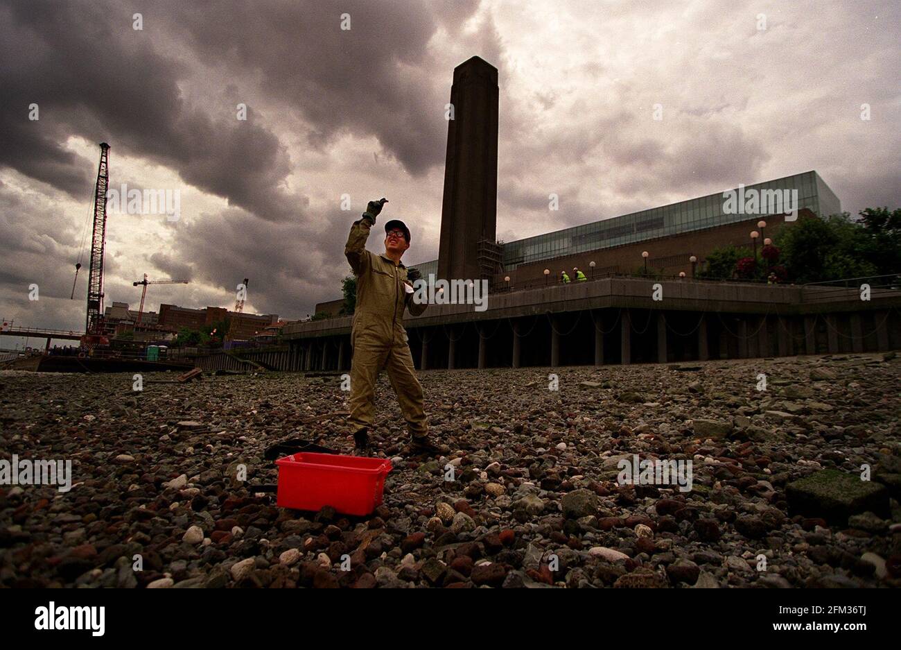 Mark Dion Thames Archaeological Dig conducting a archaeological dig on ...
