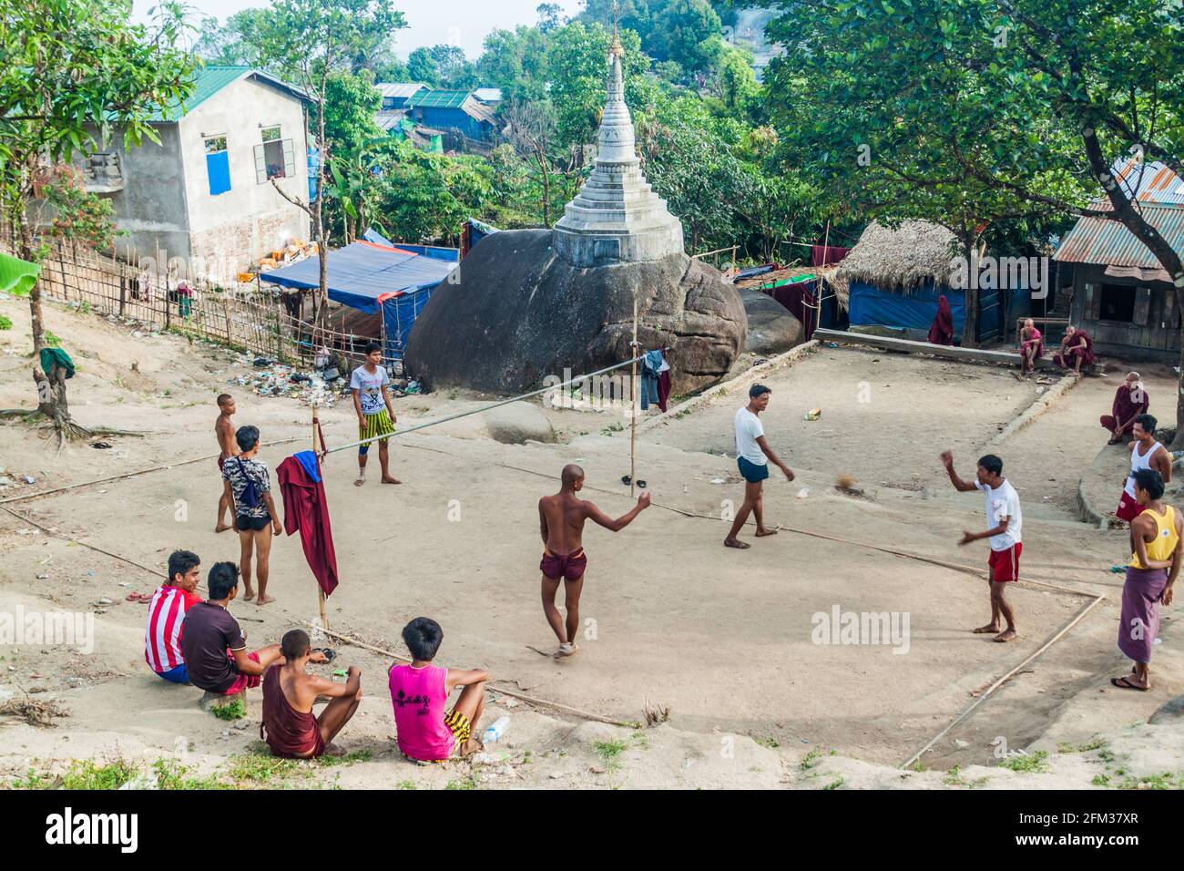 MT KYAIKTIYO, MYANMAR - DECEMBER 11, 2016: Local people playing a ...