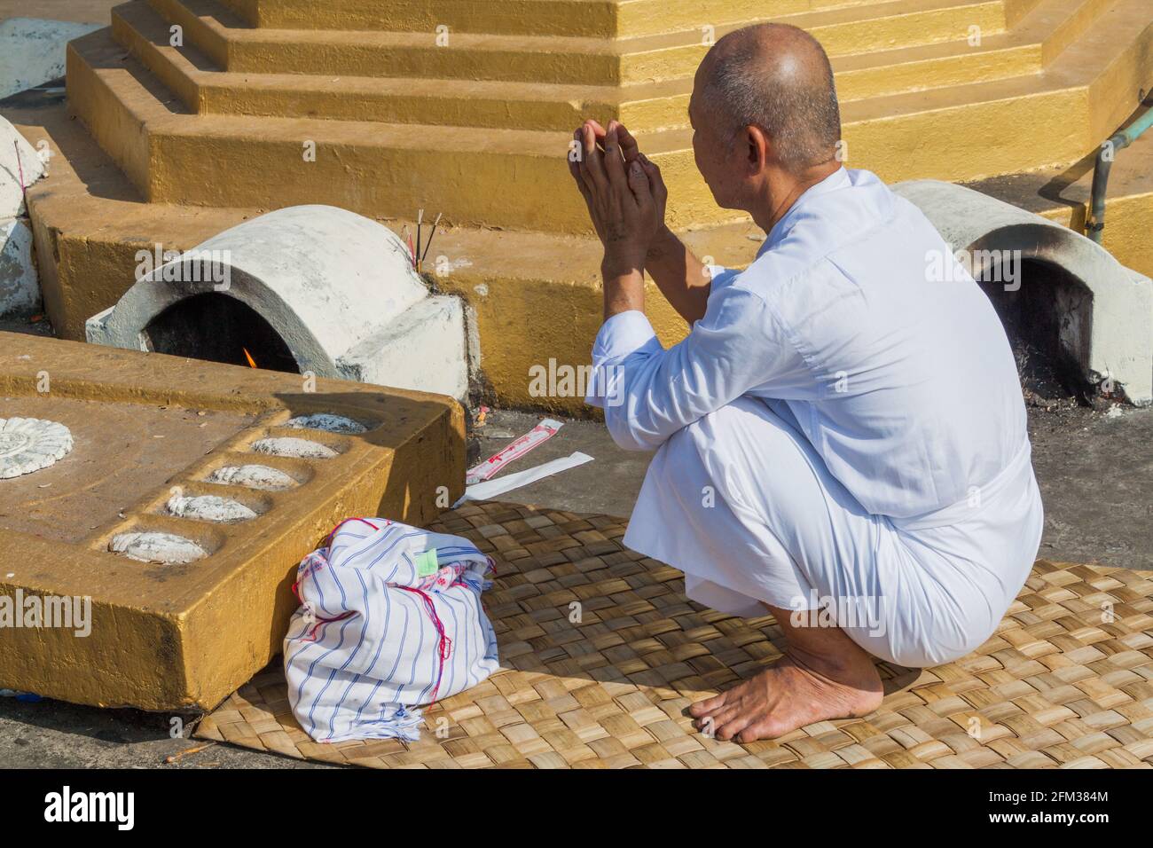 HPA AN, MYANMAR - DECEMBER 13, 2016: Buddhist man praying at Mt ...