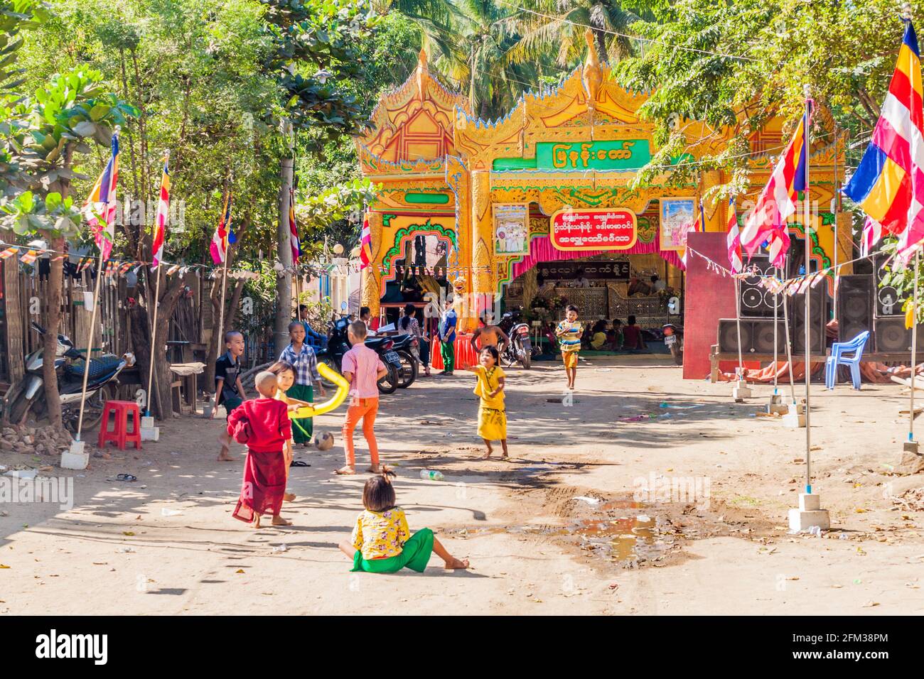 BAGAN, MYANMAR - DECEMBER 6, 2016: Children in front of a temple in ...