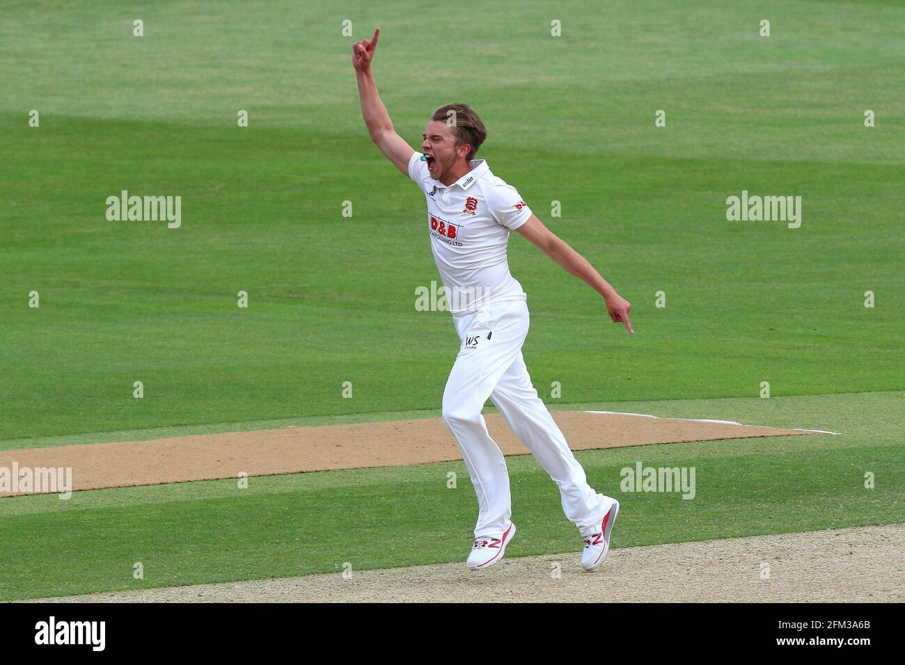 Aaron Beard of Essex celebrates taking the wicket of Billy Godleman ...