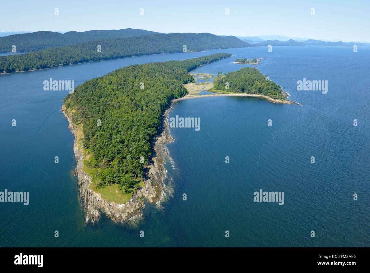 Aerial photo of Tumbo Island with Saturna Island in the background ...