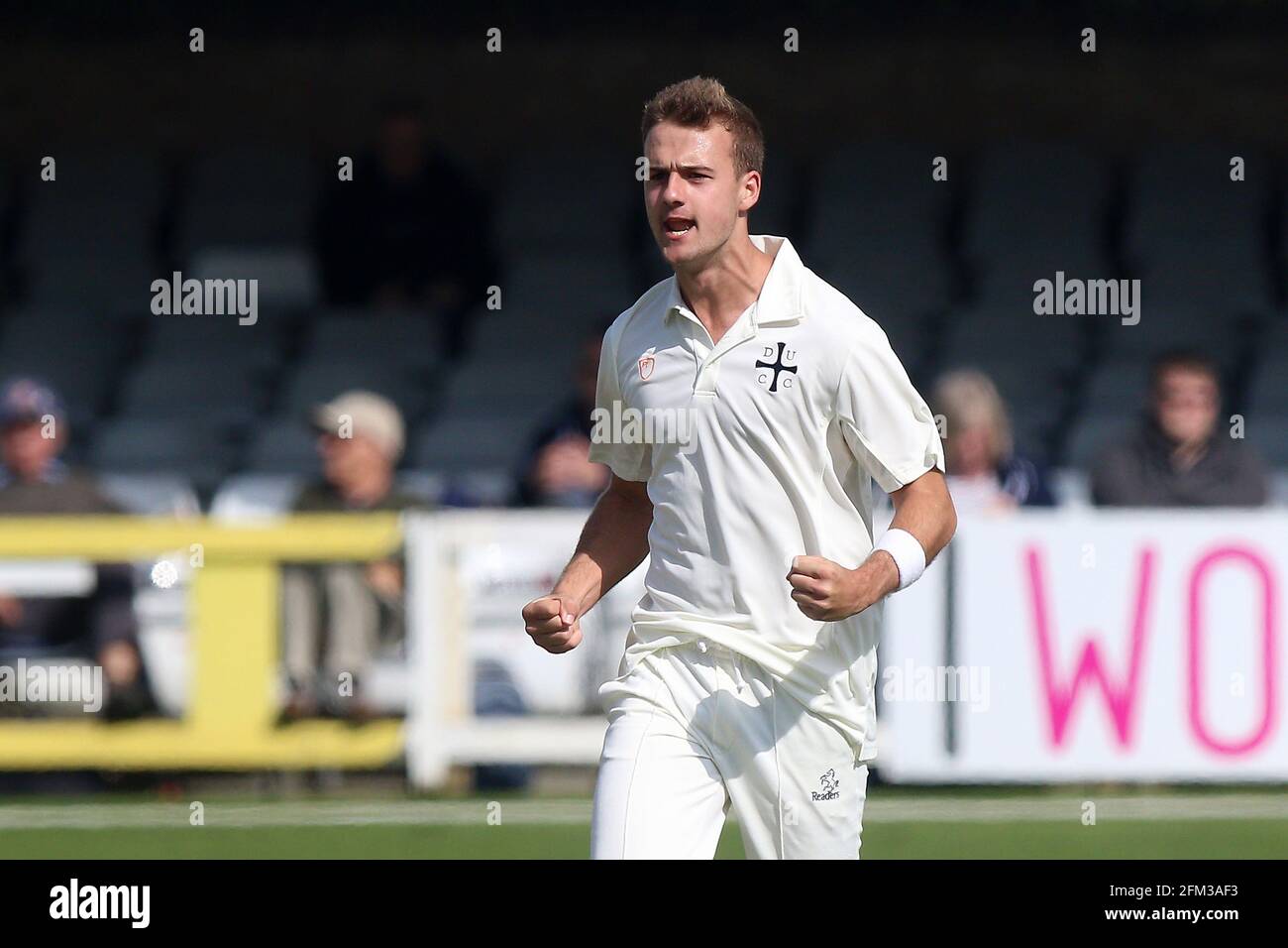 Xavier Owen of Durham celebrates taking the wicket of Varun Chopra ...