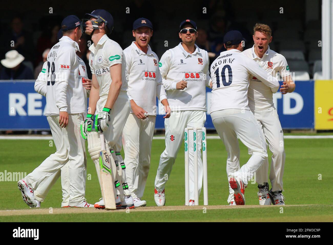 Jamie Porter (R) of Essex celebrates taking the wicket of Cameron ...