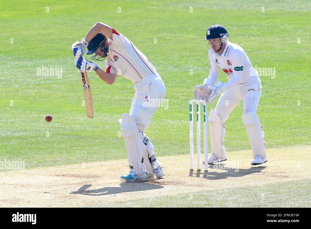 Dane Vilas in batting action for Lancashire as Adam Wheater looks on ...