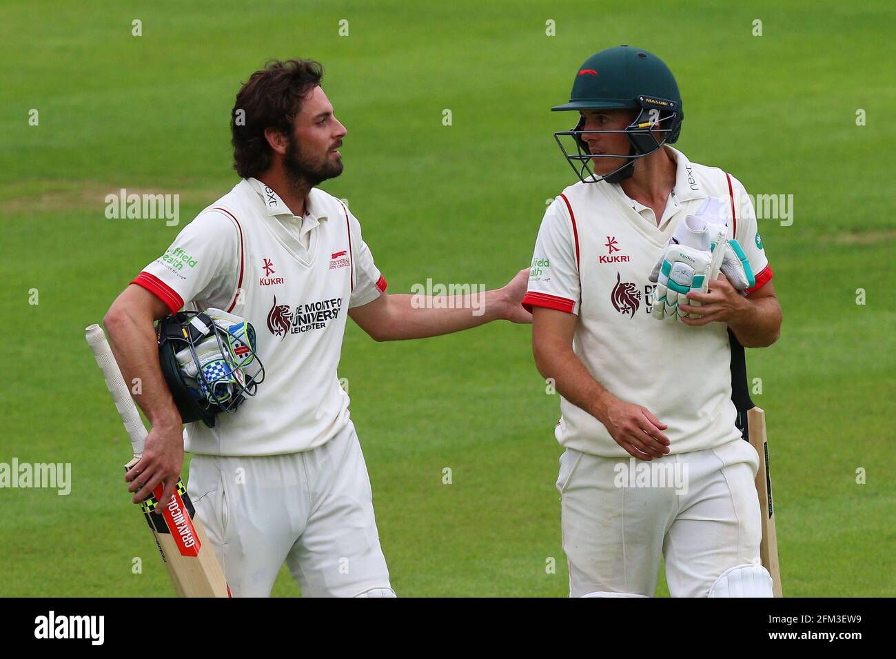 Leicestershire batsmen Ned Eckersley (L) and Neil Dexter celebrate ...