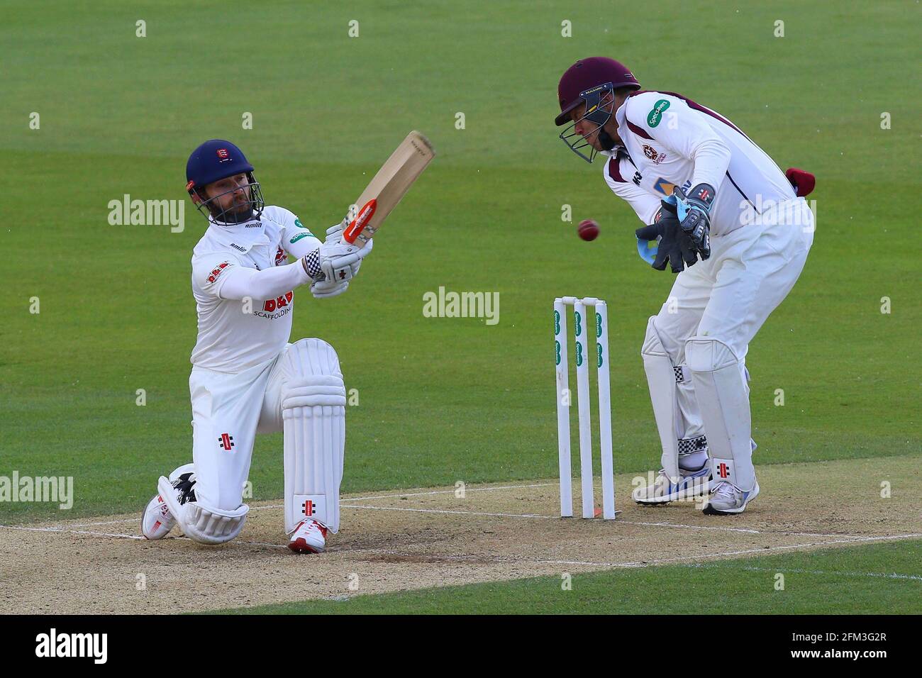 James Foster hits four runs for Essex as Adam Rossington looks on from ...
