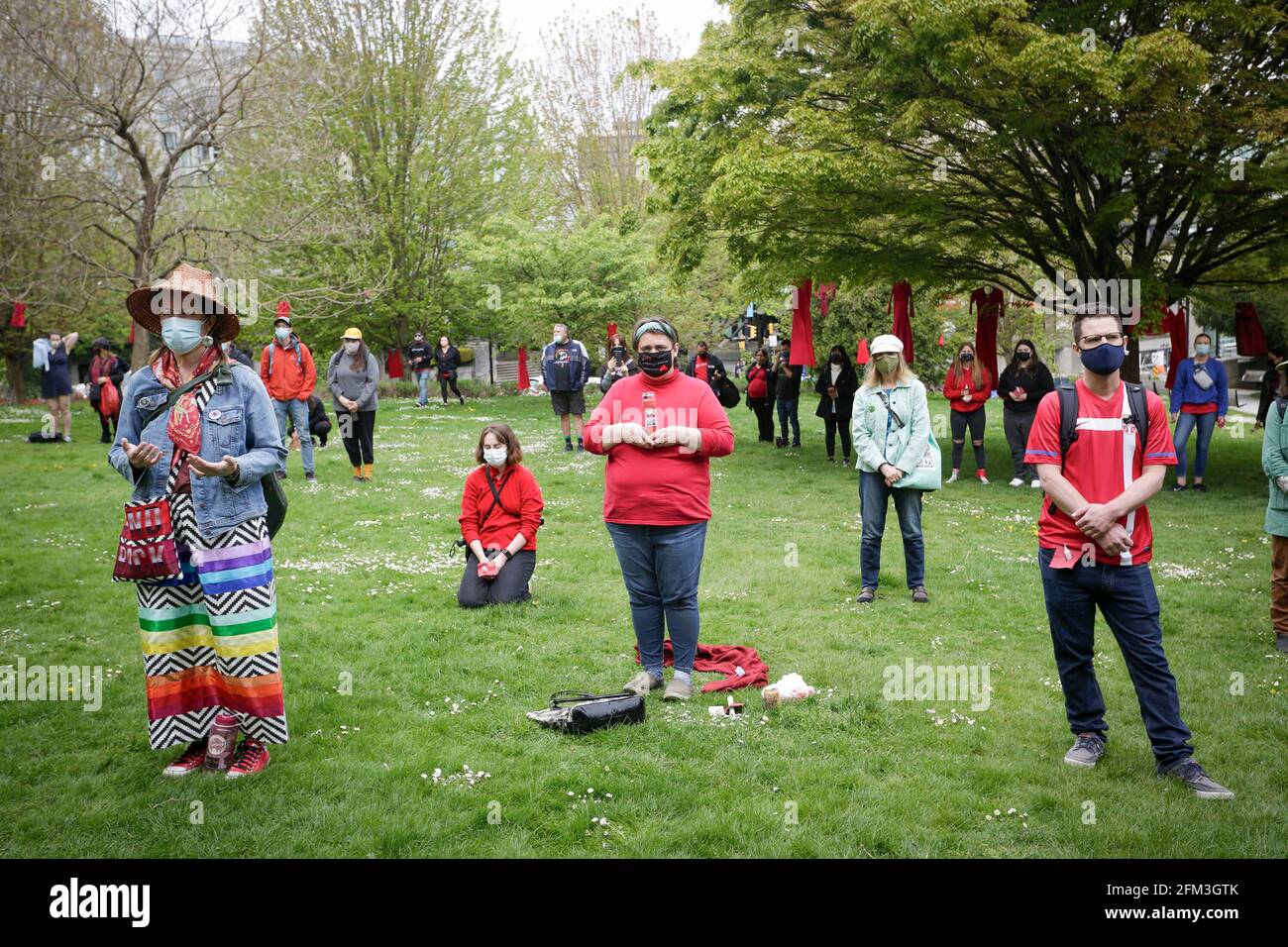 Vancouver, Canada. 5th May, 2021. People attend a Red Dress Day event ...
