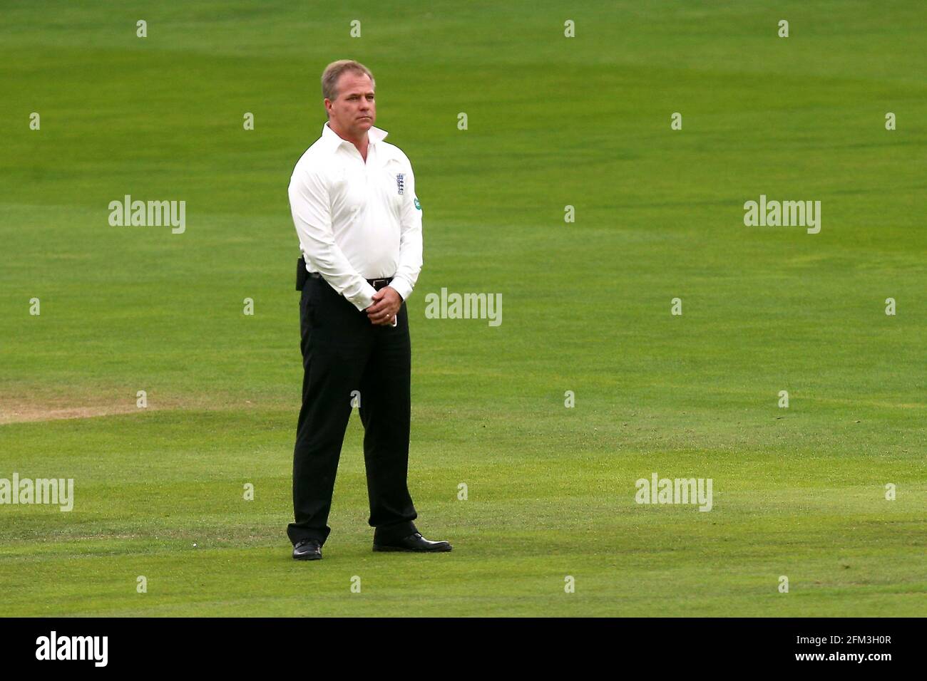 Phil Whitticase stands at square leg after replacing umpire Neil ...
