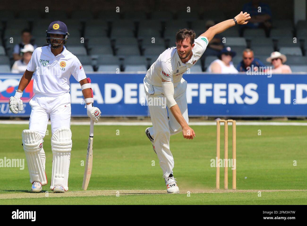 Tom Moore in bowling action for Essex during Essex CCC vs Sri Lanka ...