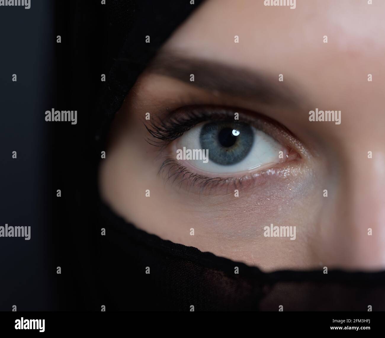 Portrait of muslim woman wearing niqab and traditional arabic clothes ...