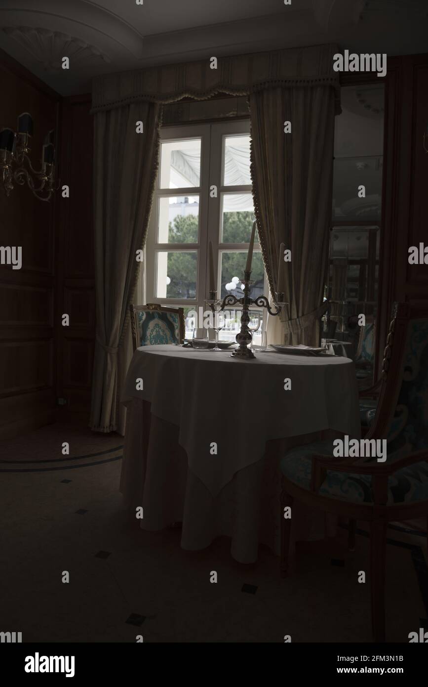 Romantic Table with Window Light Stock Photo - Alamy
