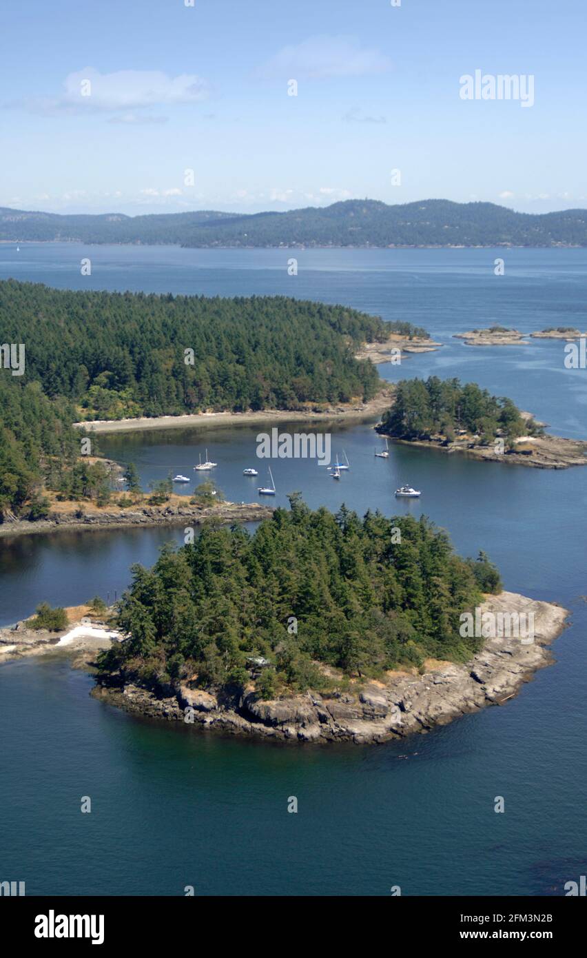 Aerial view looking over Hood Island to the anchorage at Princess Bay ...