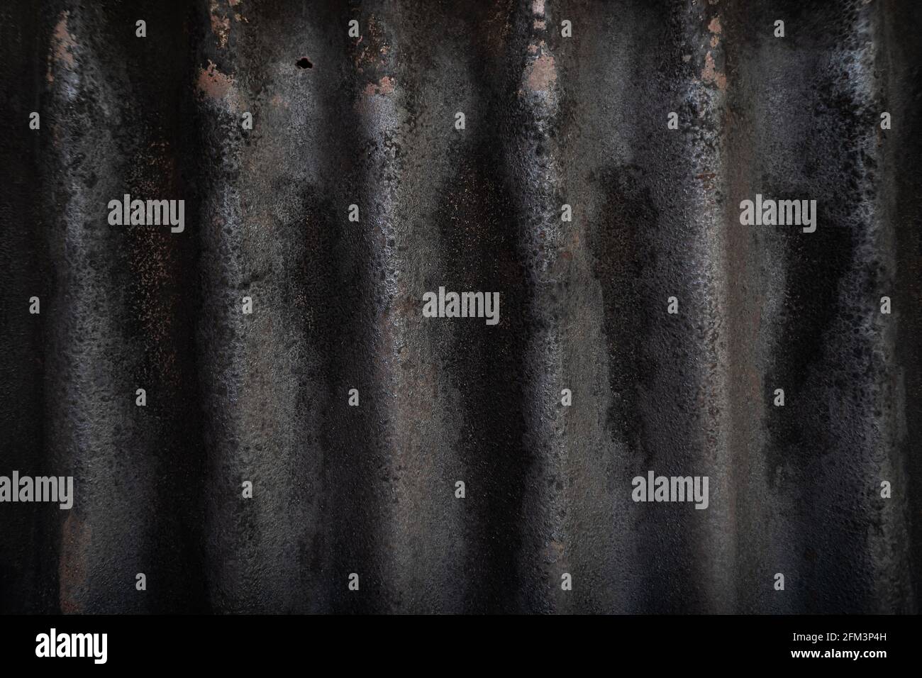 The black old zinc corrugated steel sheet has rust on the texture Stock ...