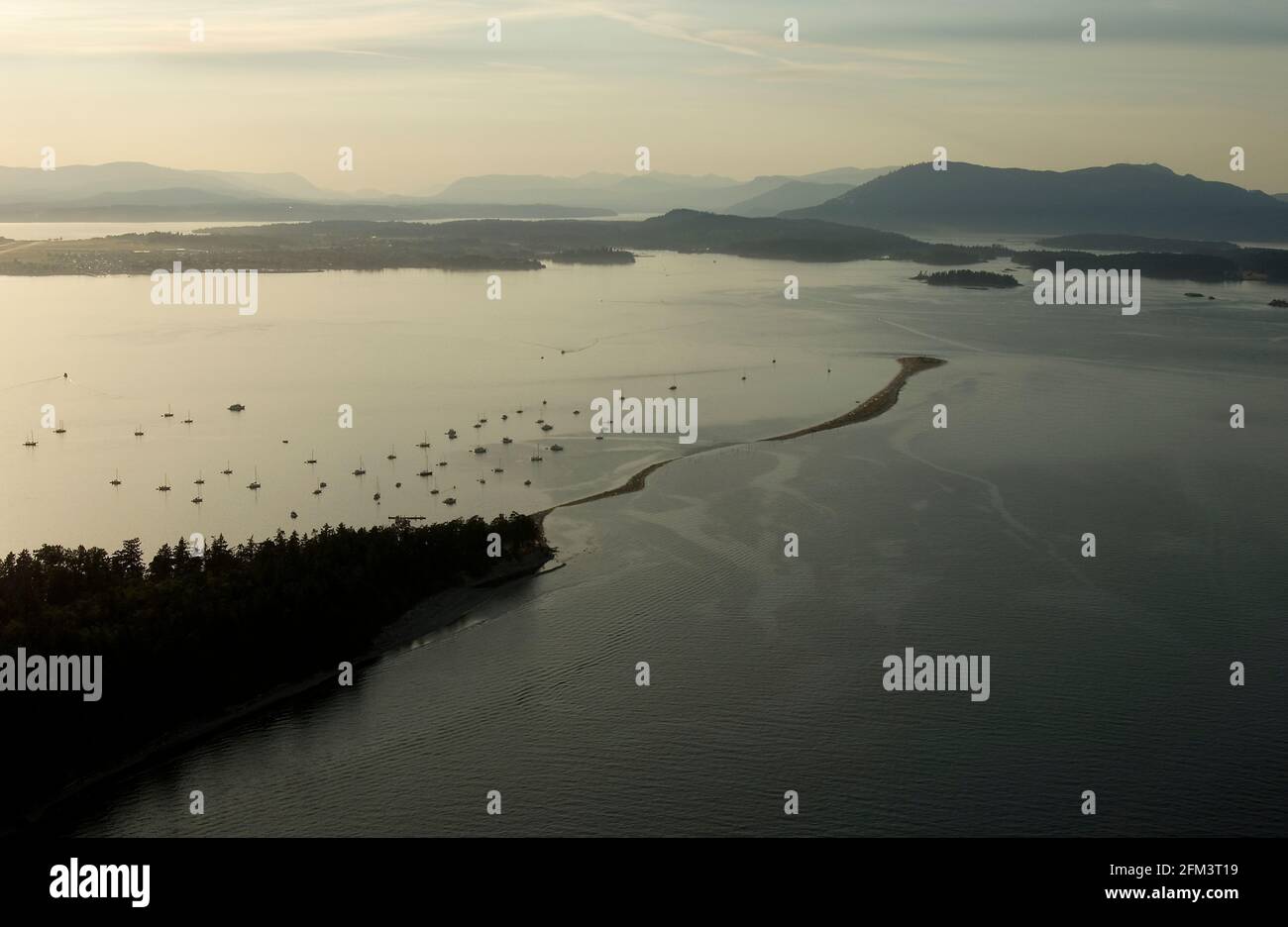 The anchorage at Sidney Spit at sunset, Gulf Islands National Park ...