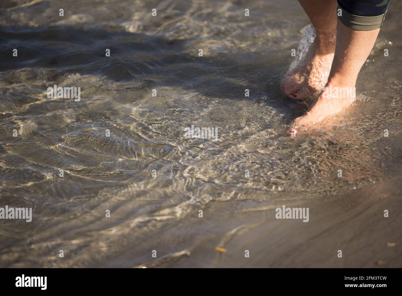 Woman wading in river hi-res stock photography and images - Alamy