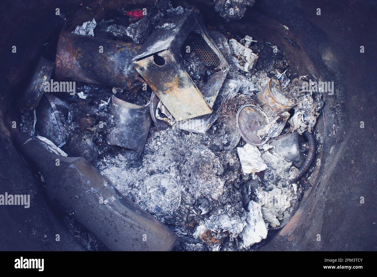 Burnt trash. Remains of burnt garbage. Household waste. Waste disposal ...