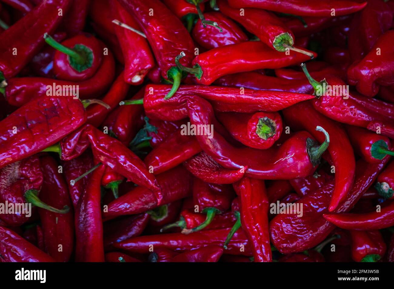 Close-up red vegetable for background, pepper texture. Red peppers form ...
