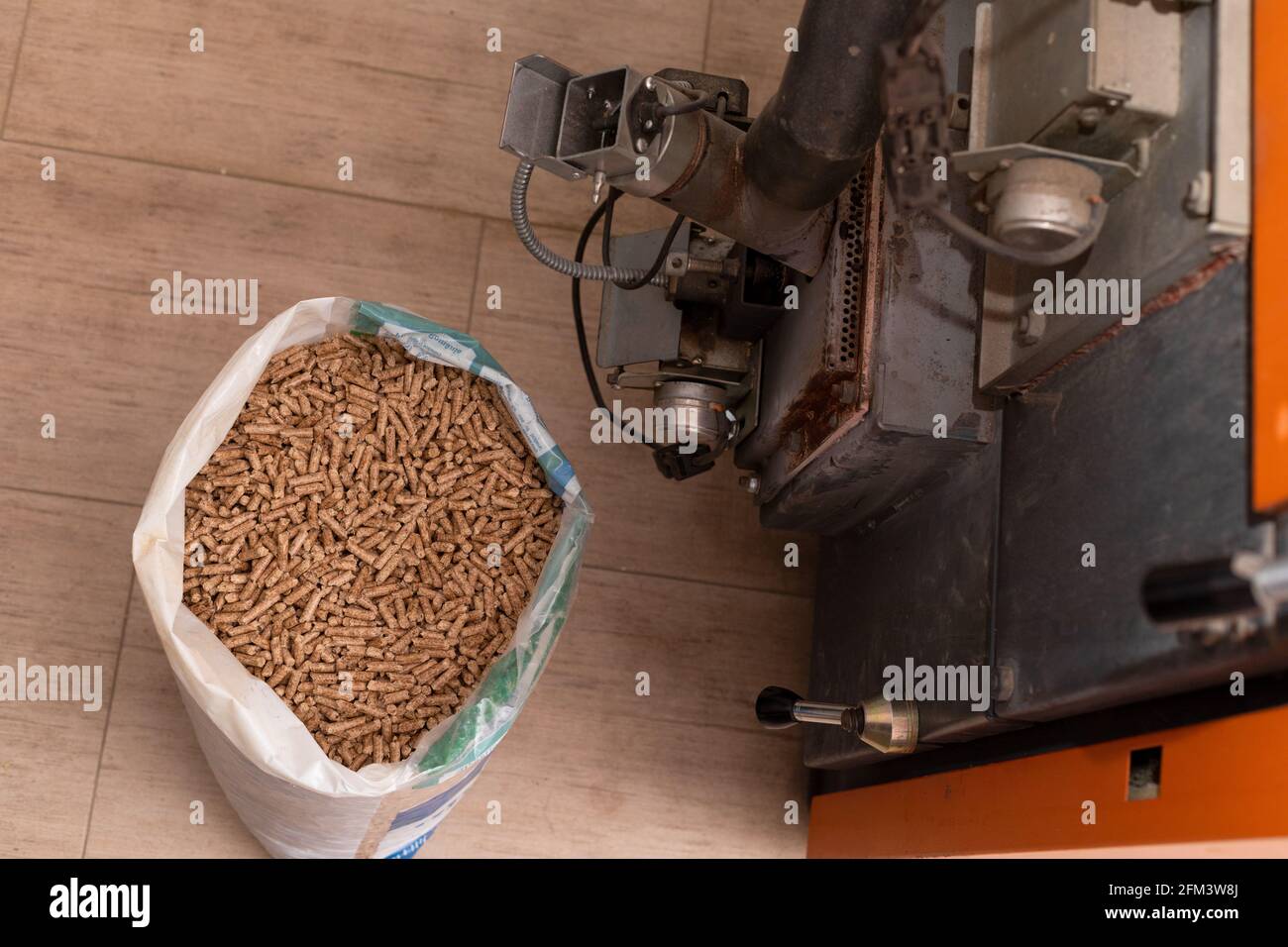 Picture of an automatic pellet burner system Stock Photo - Alamy