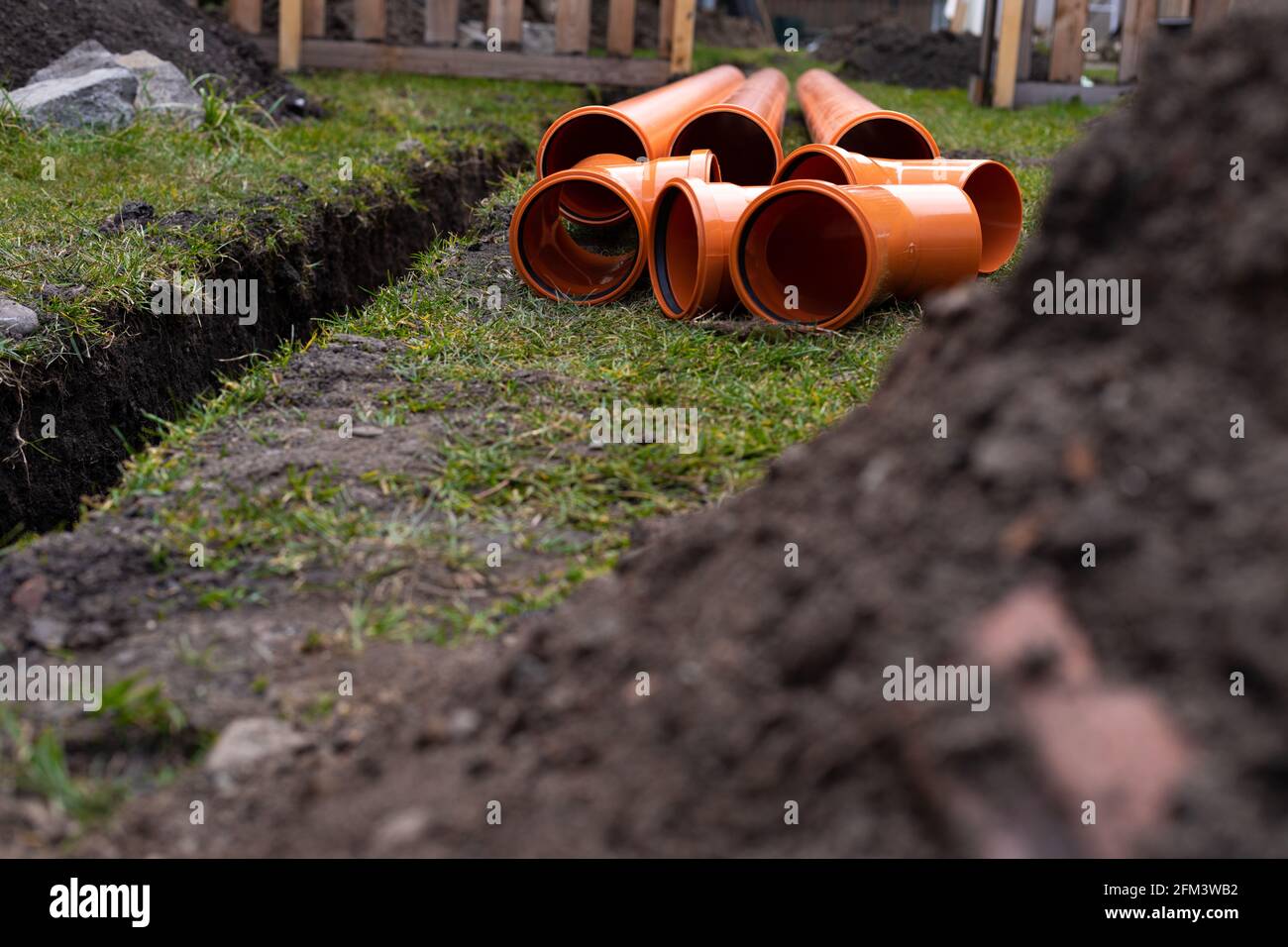 Laying sanitary pvc sewage hi-res stock photography and images - Alamy