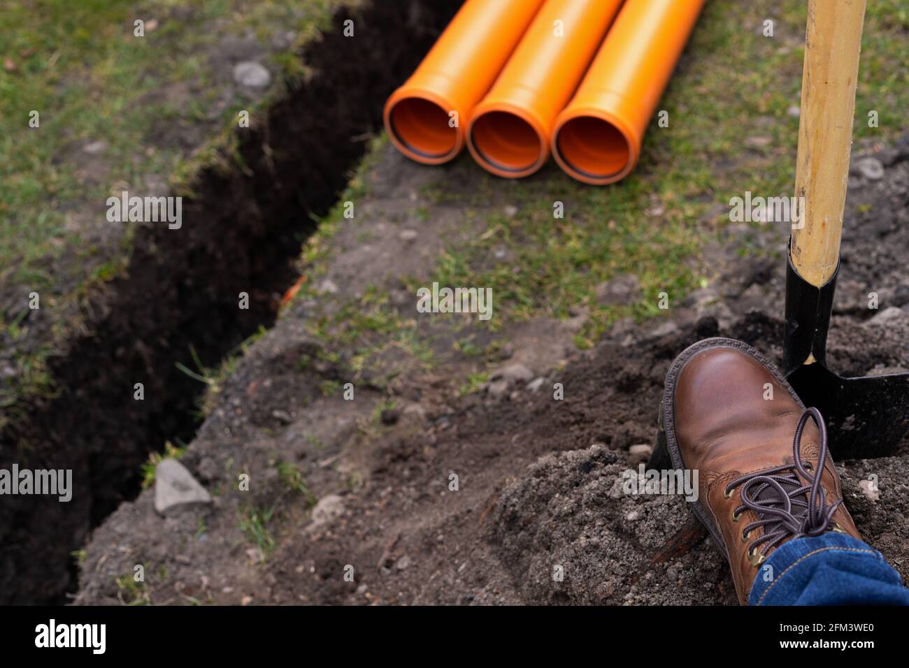 Laying sanitary pvc sewage hi-res stock photography and images - Alamy