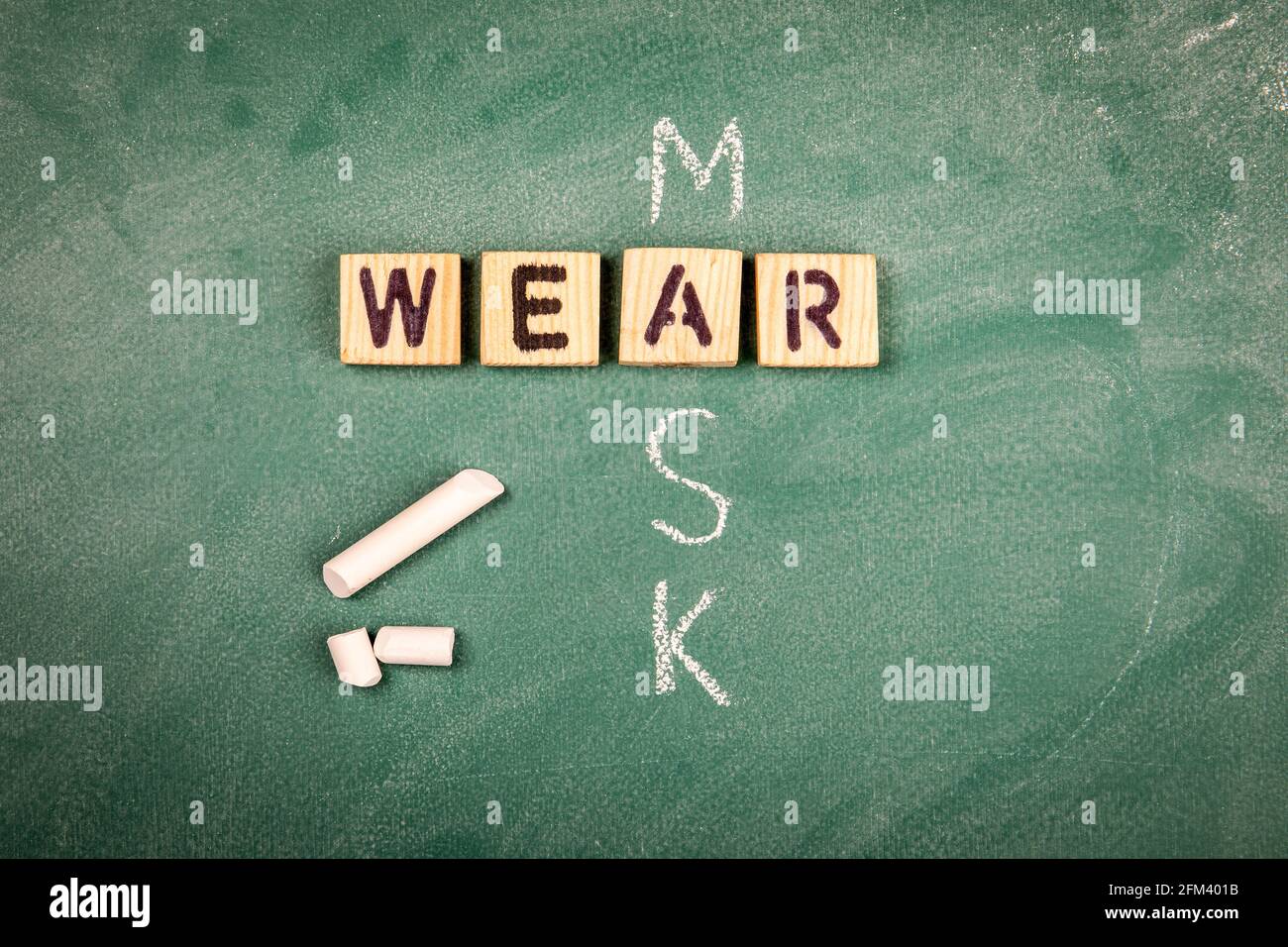 Wear mask wooden alphabet hi-res stock photography and images - Alamy