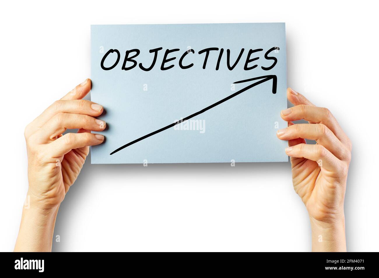 Hands of a woman holding cardboard with an arrow and the word ...