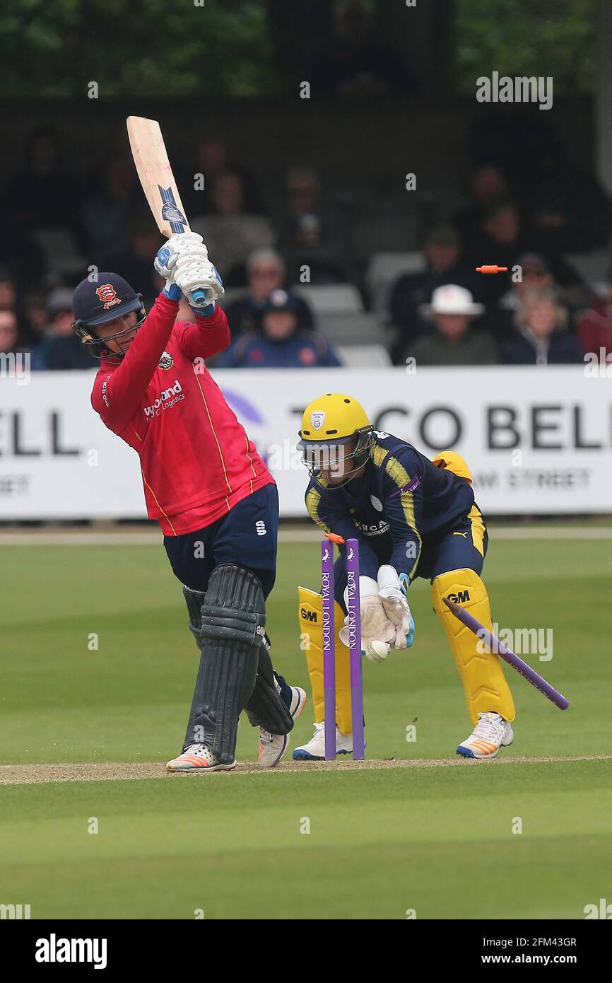 Adam Wheater of Essex is bowled out by Sean Ervine as Lewis McManus ...