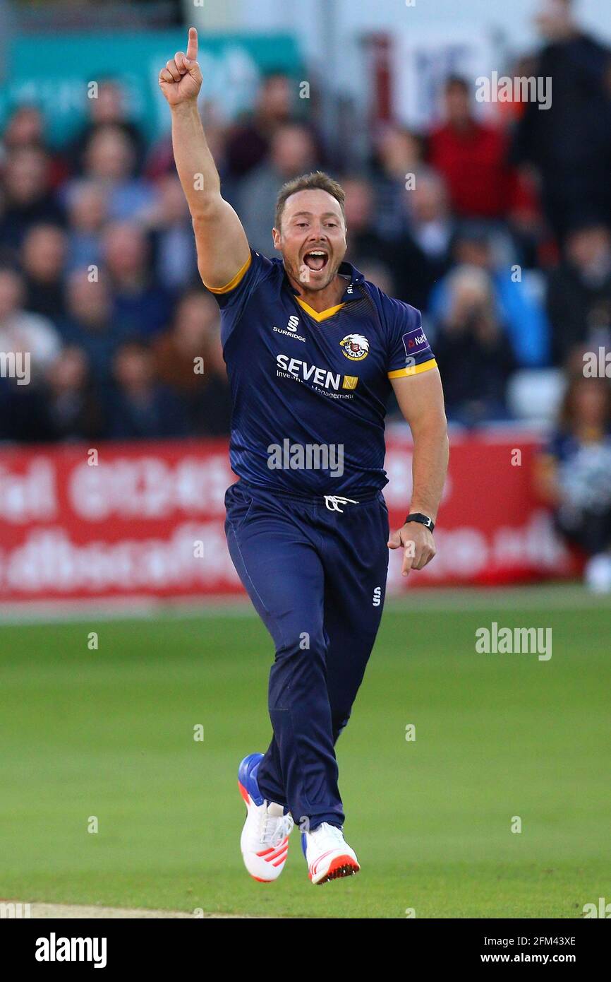 Graham Napier of Essex celebrates taking the wicket of Sam Northeast ...