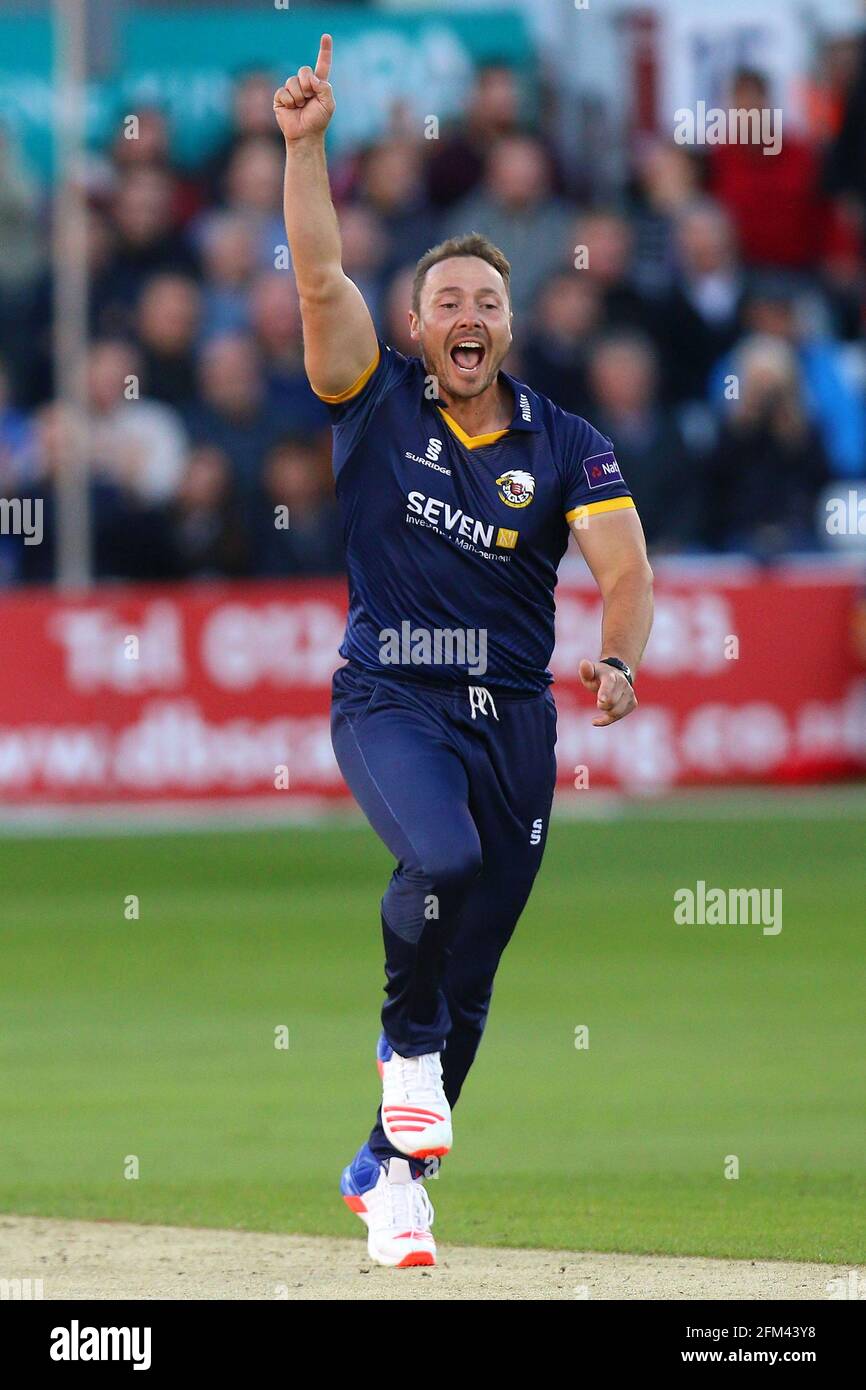 Graham Napier of Essex celebrates taking the wicket of Sam Northeast ...