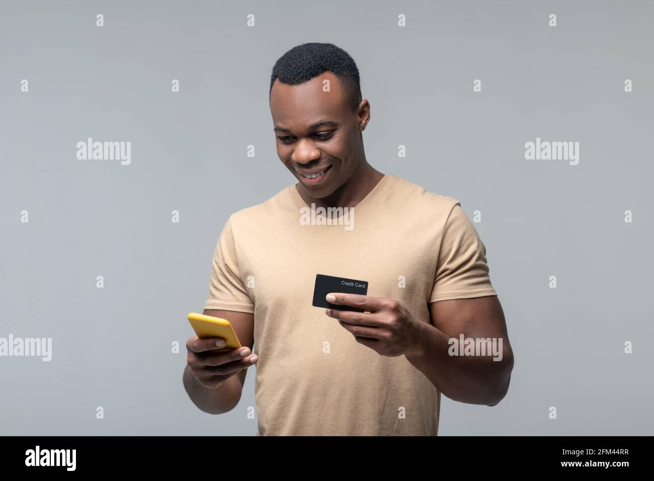 Muscular man credit card hi-res stock photography and images - Alamy