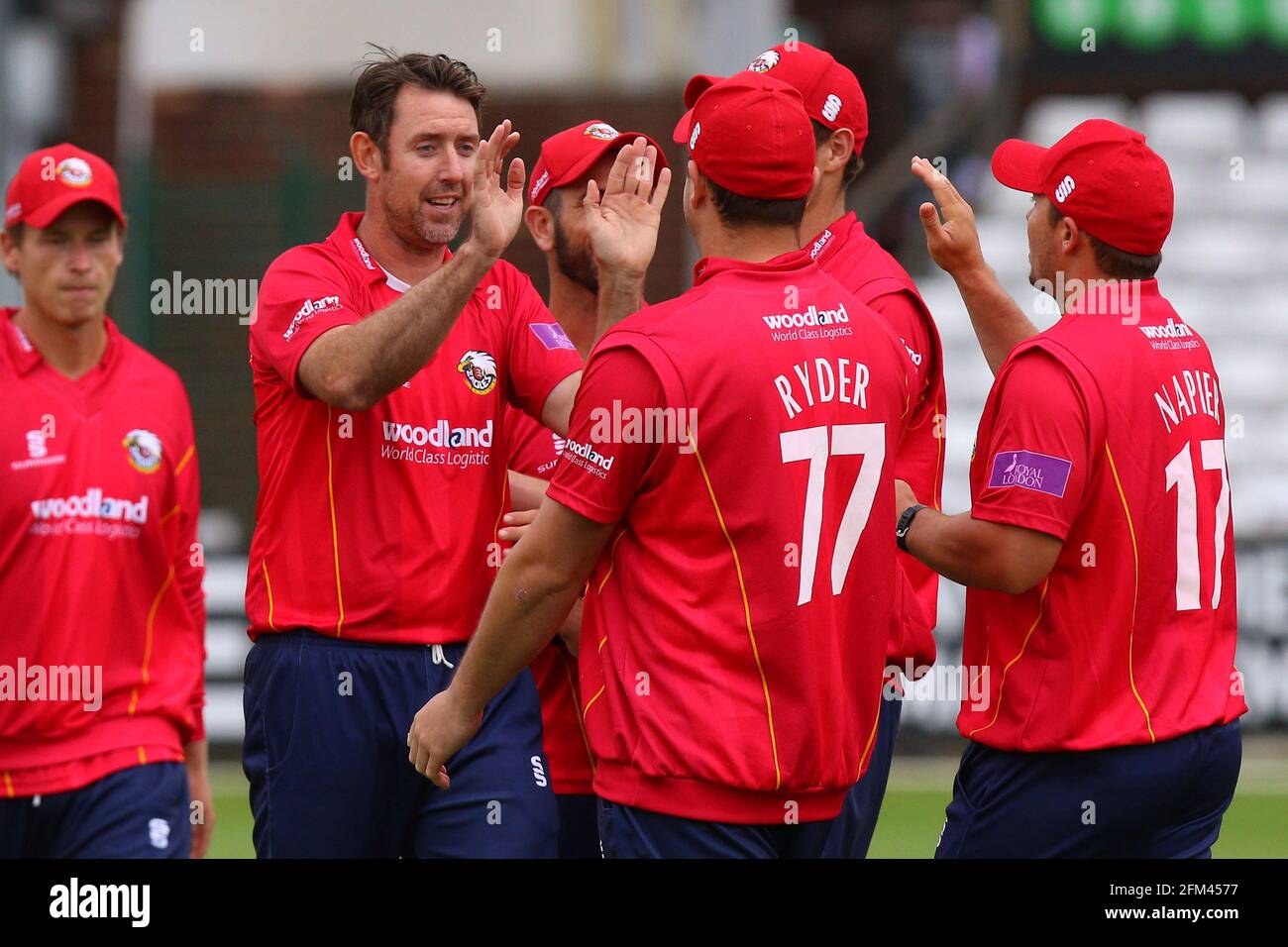 David Masters (L) of Essex celebrates taking the wicket of Peter Trego ...