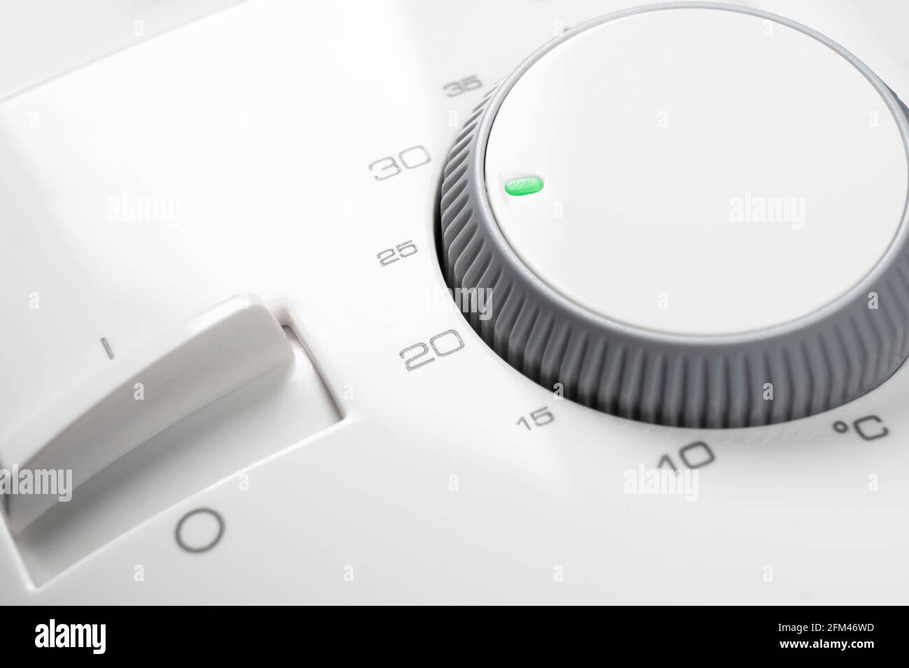 Digital climate thermostat control. White thermostat isolated on white ... Digital climate thermostat control. White thermostat isolated on white ...