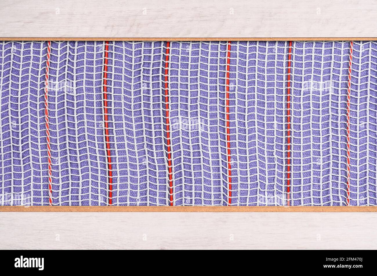 Heated floor under laminate background. Underfloor electric heating ...