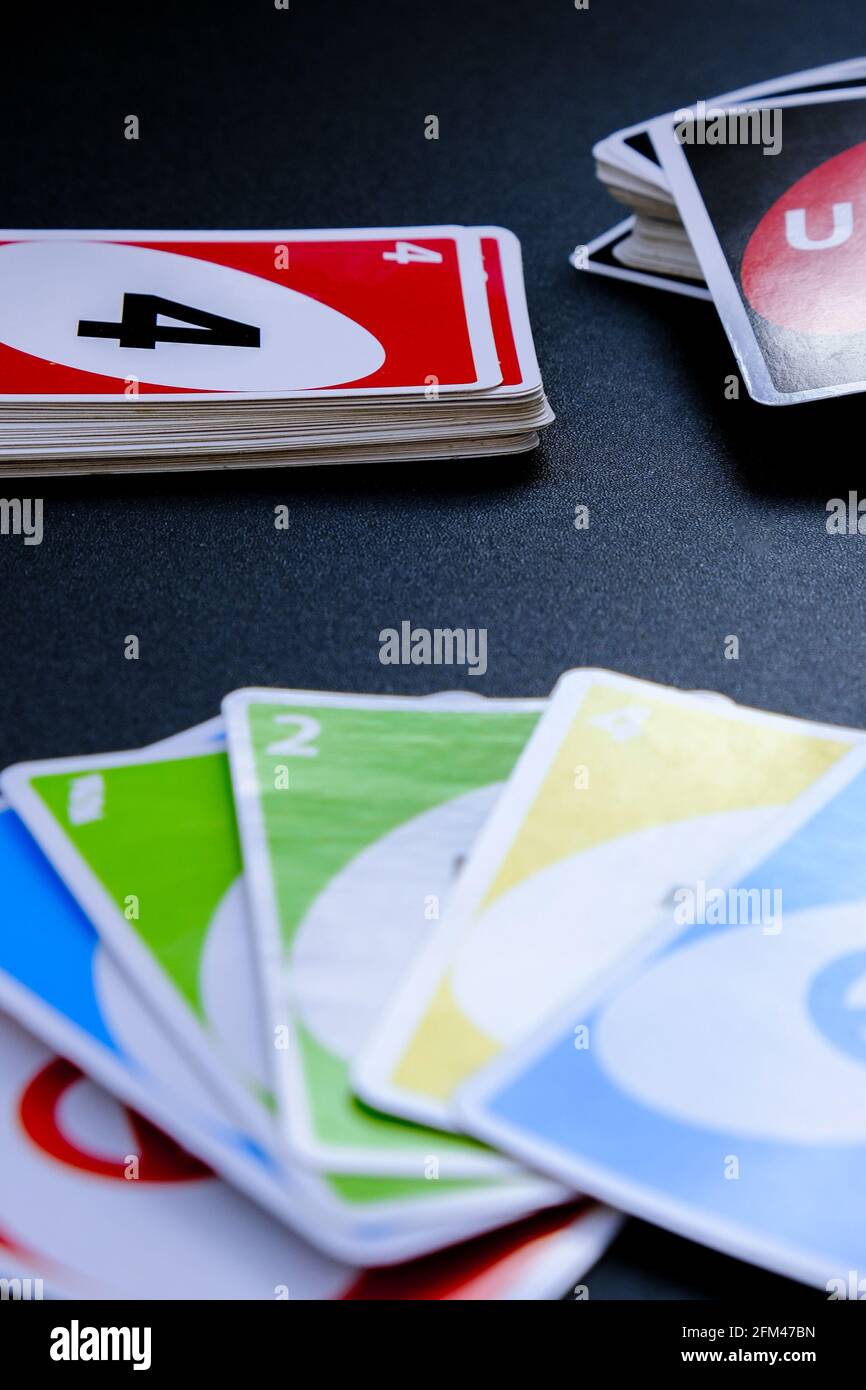Kiev, Ukraine - 10.03.2021 Playing cards UNO on black Table games ...