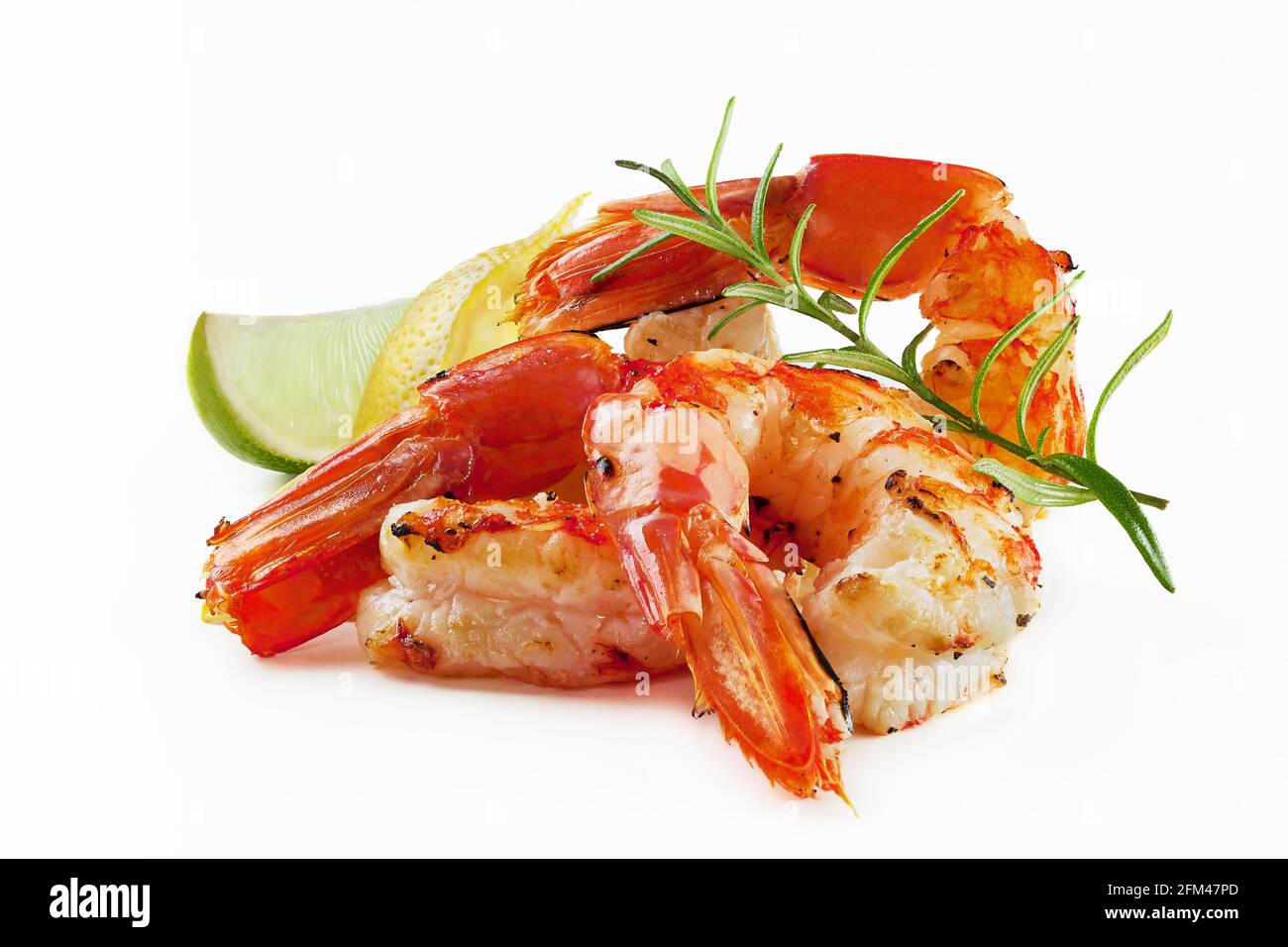 Grilled prawn tails with lemon, lime, rosemary on white Stock Photo - Alamy