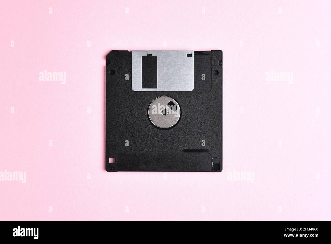 Floppy disk on pink background. Retro computer diskette Stock Photo - Alamy