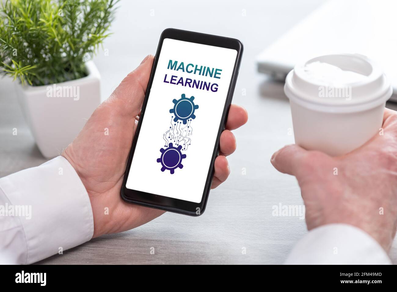Smartphone screen displaying a machine learning concept Stock Photo - Alamy
