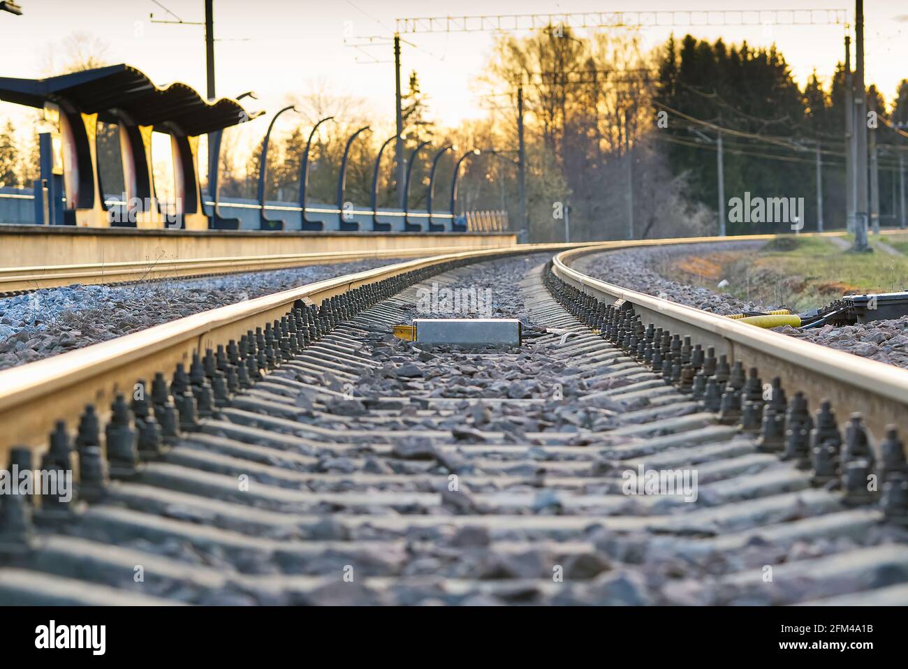 railroad rails on concrete sleepers. updated railway for high-speed ...