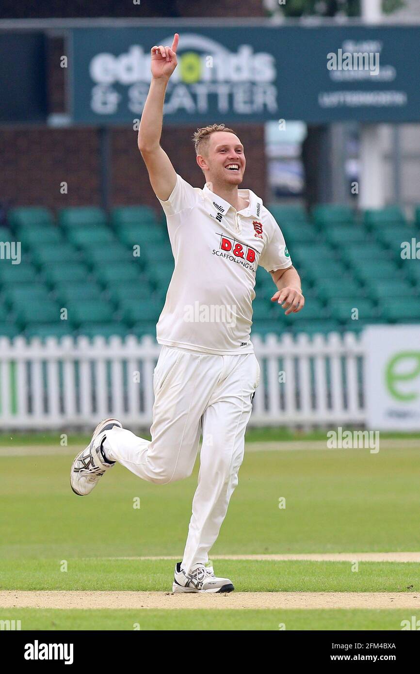 Jamie Porter of Essex celebrates taking the wicket of Mark Pettini ...