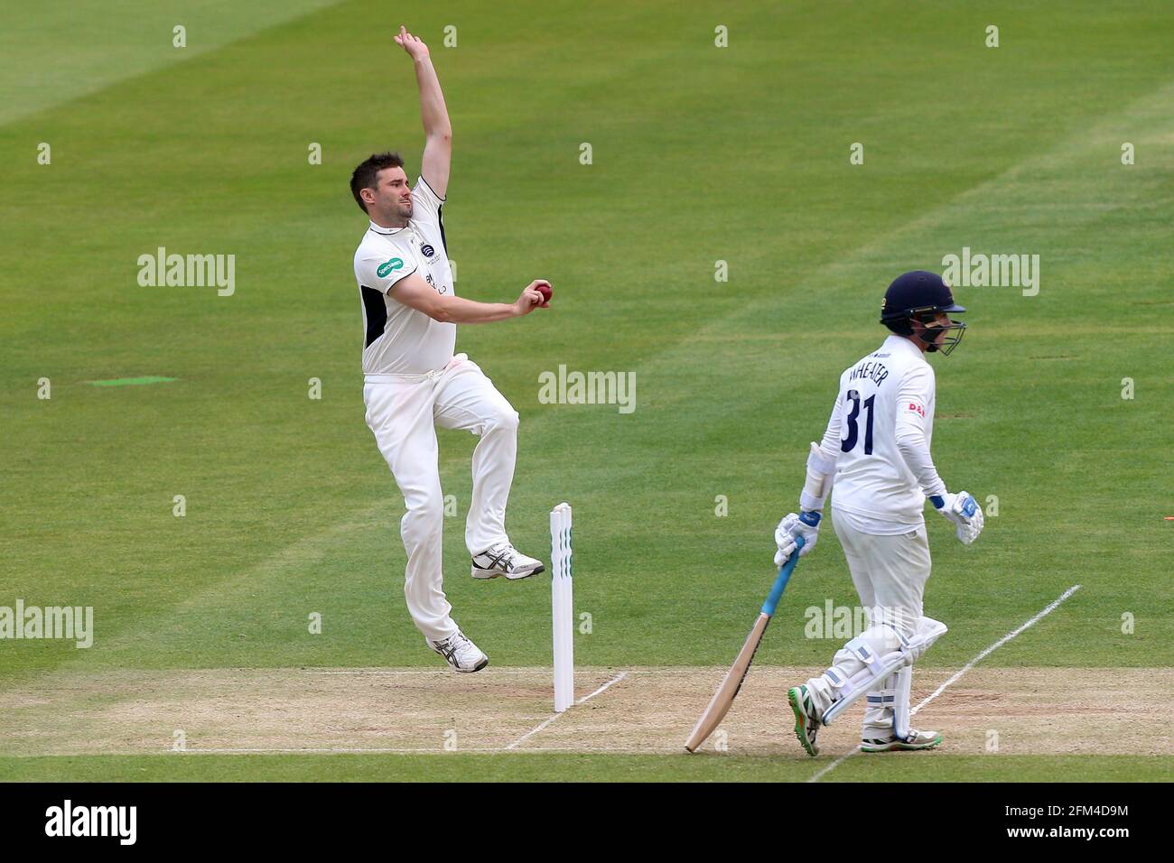 Tim Murtagh in bowling action for Middlesex during Middlesex CCC vs ...