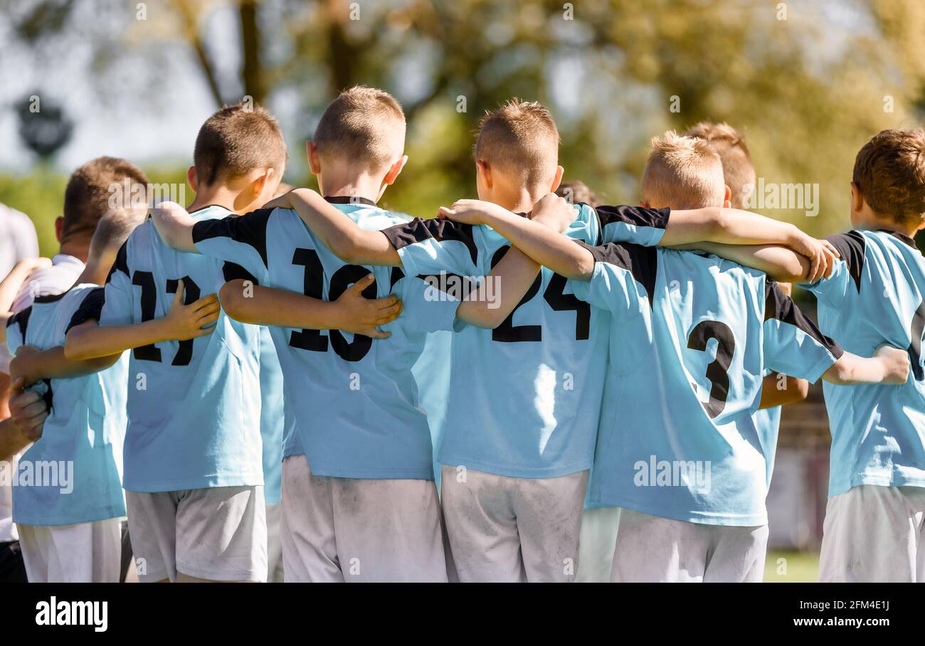 Kids Team Members in Sport Team. Happy Boys Huddling in Football Team ...