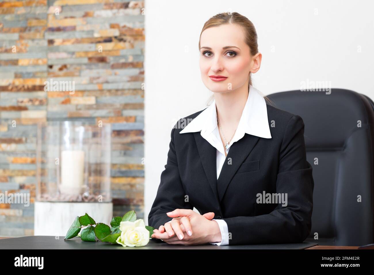 Undertaker for the funeral is giving solace in the funeral parlor Stock ...