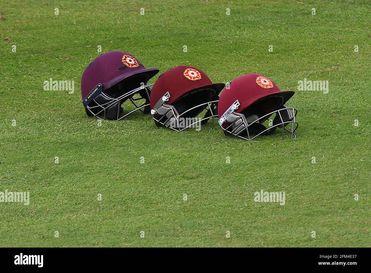 Three Northants helmets in the field during Northamptonshire CCC vs ...