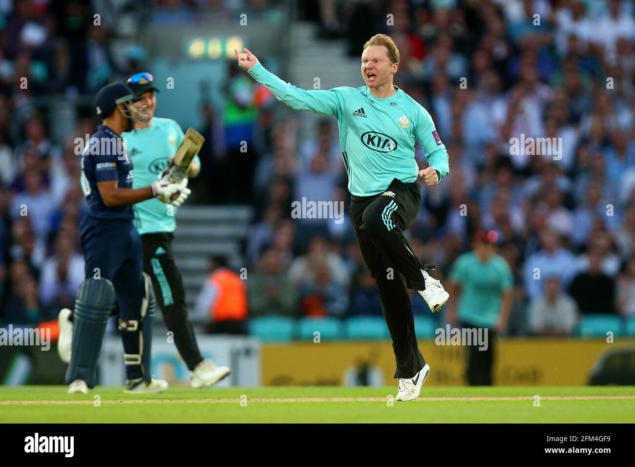 Gareth Batty of Surrey celebrates taking the wicket of Adam Wheater ...